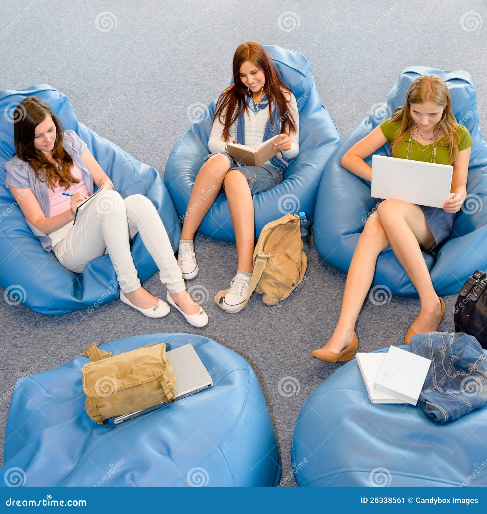 Group of Students Relax on Beanbag Stock Image - Image of college ...