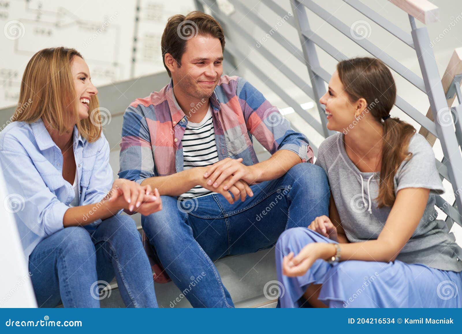 Group of Students Relaxing in the Campus Stock Photo - Image of team ...