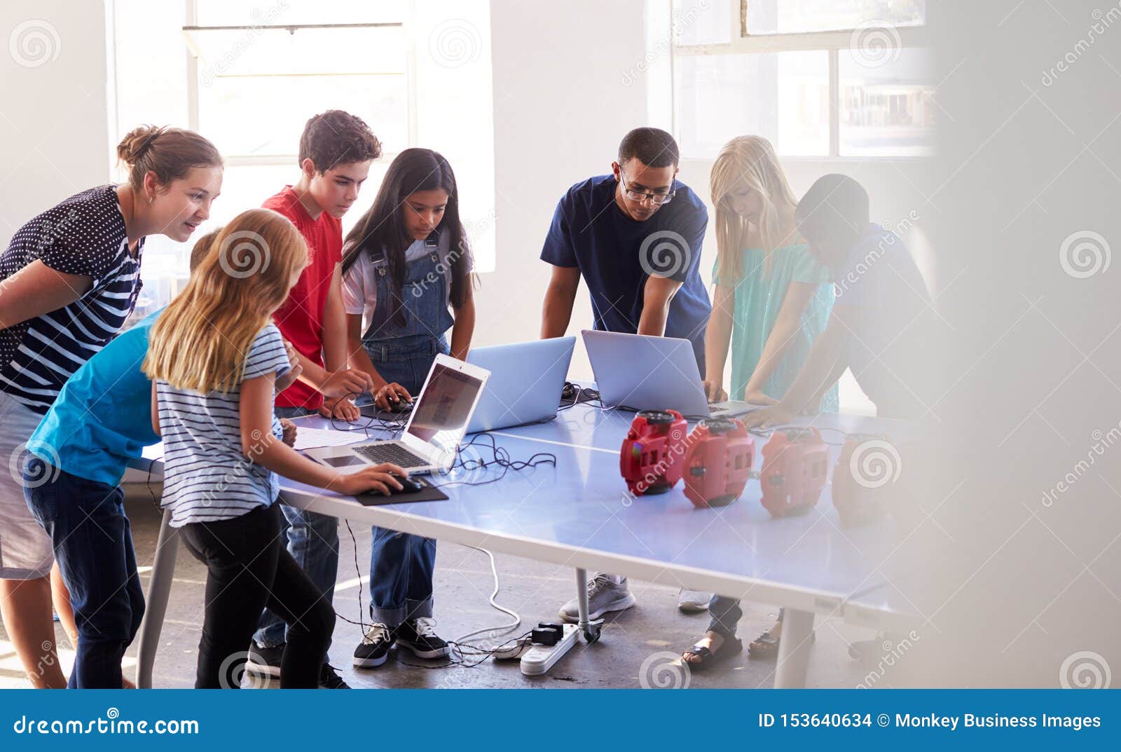 Group of Students in after School Computer Coding Class Learning To ...