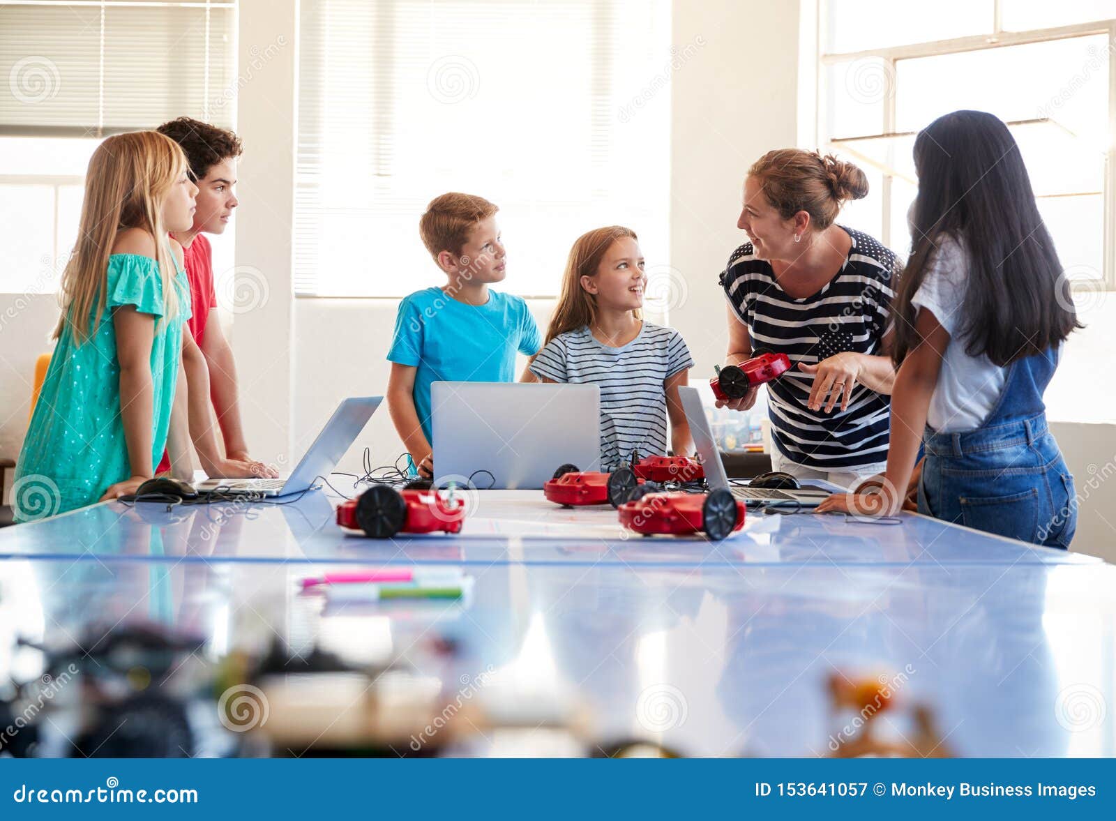Group of Students in after School Computer Coding Class Learning To ...