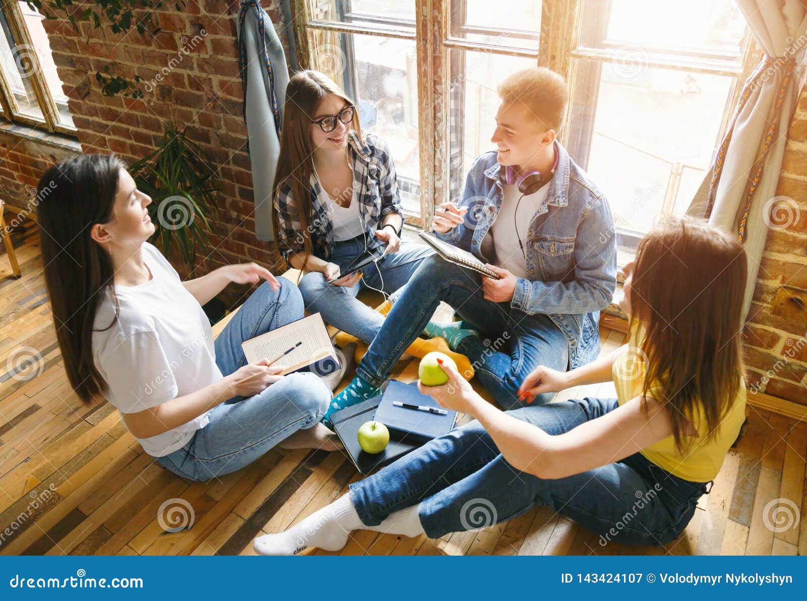 Group of Students Chatting stock image. Image of brick - 143424107