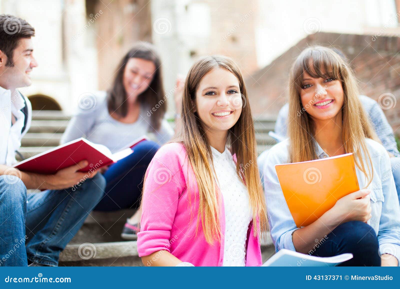 Group of Students Sitting Outdoors Stock Image - Image of person ...