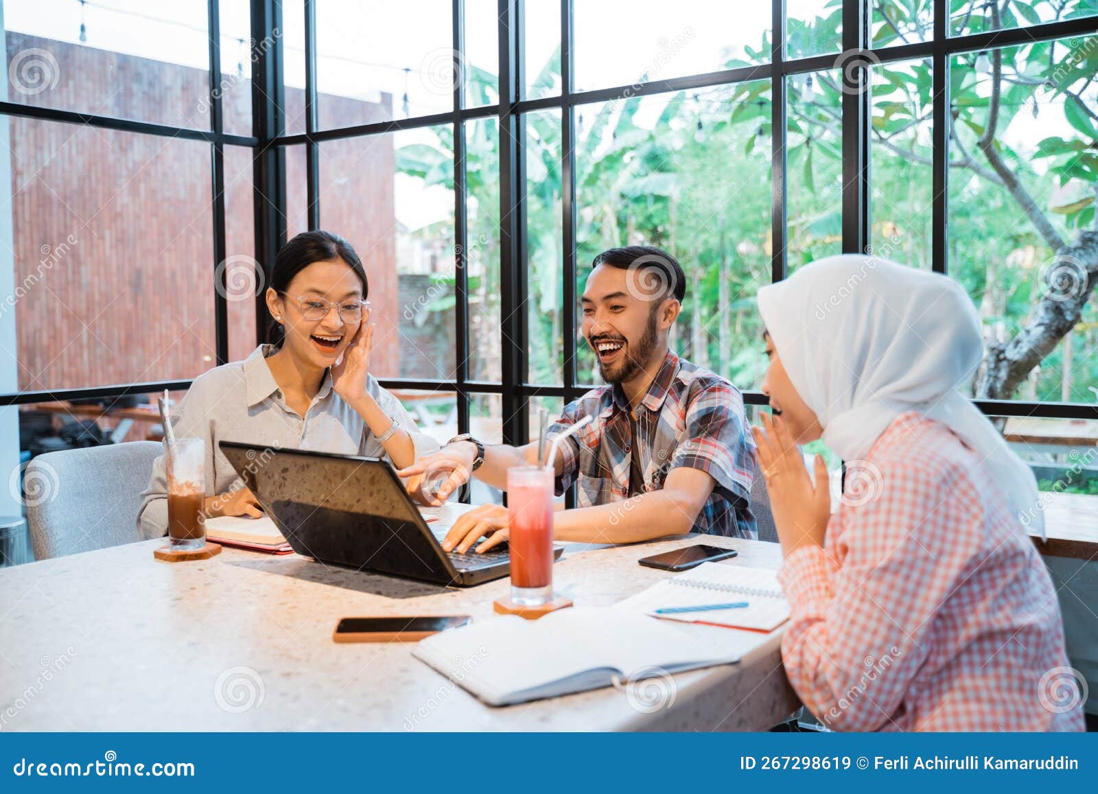 Group of Students Smiling Happily while Working Together Stock Image ...