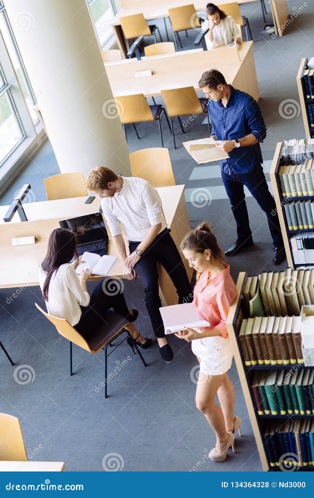Group of Students Studying in a Library Stock Photo - Image of student ...