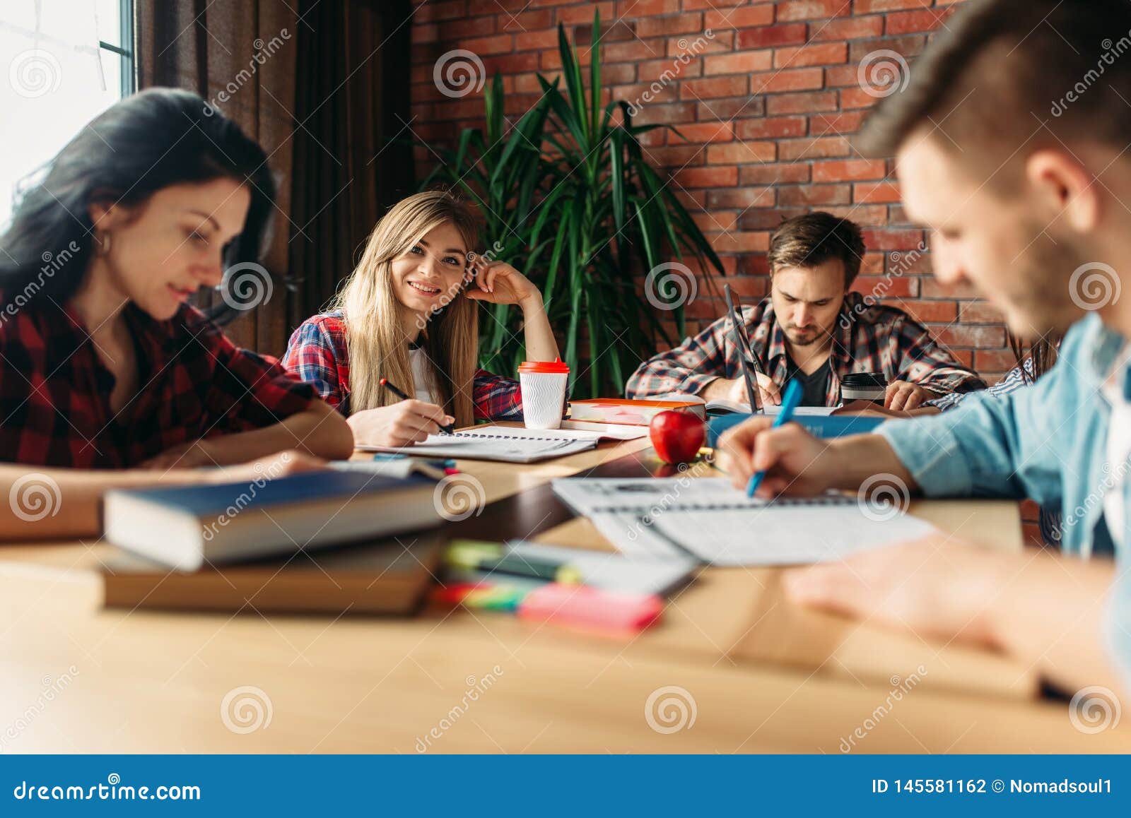 Group of Students Studying at the Table Stock Photo - Image of ...