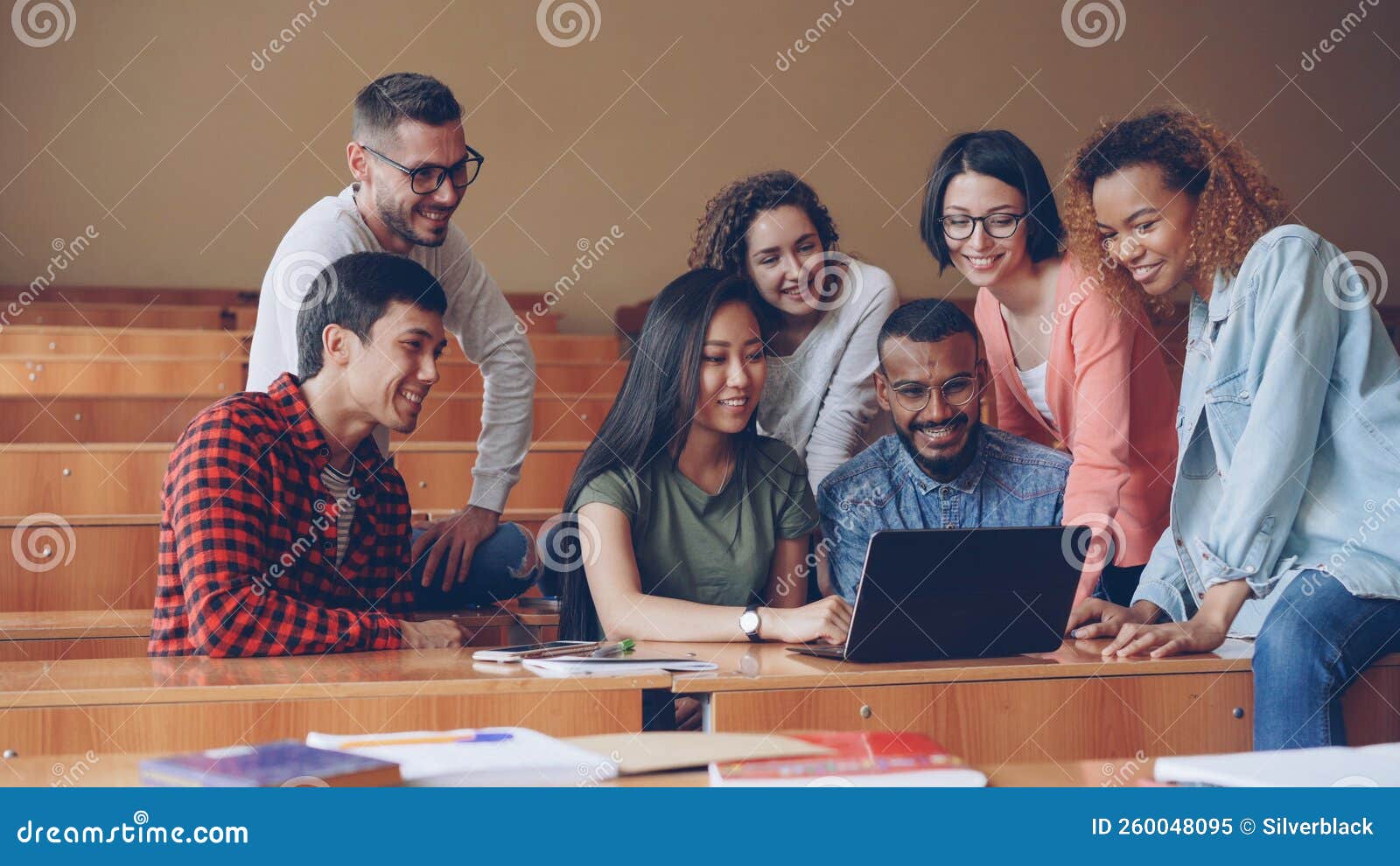Group of Students is Taking Part in Video Conference Using Laptop, they ...
