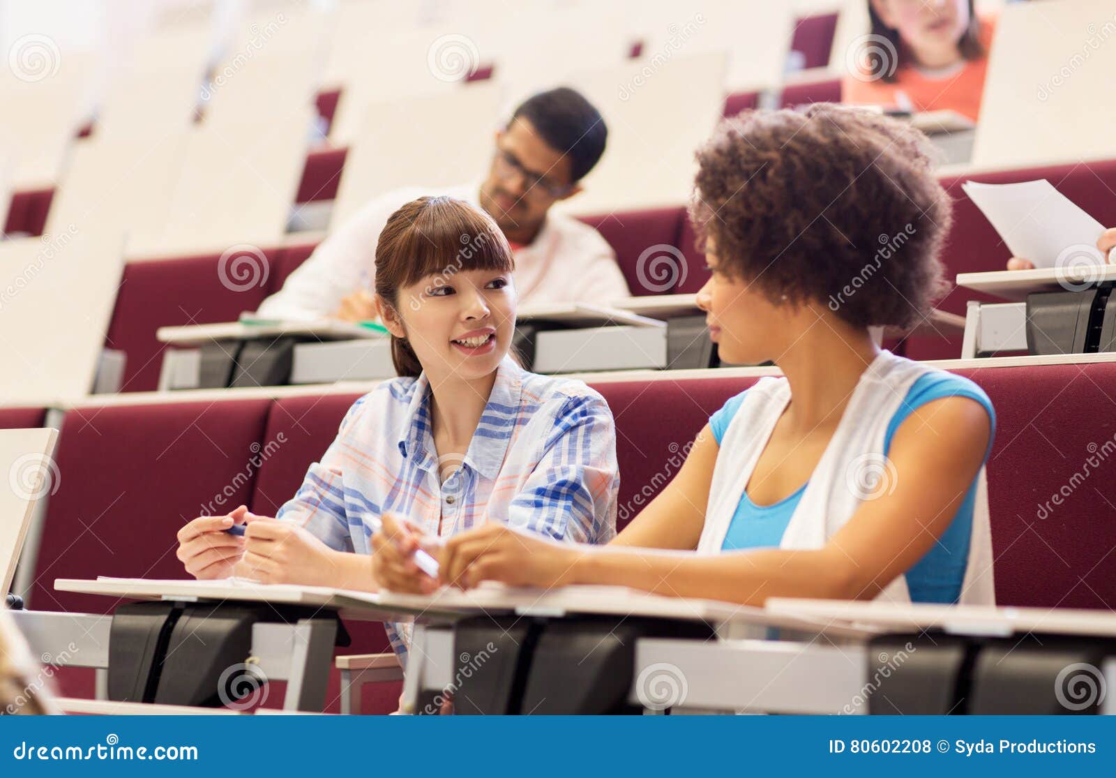 Group of Students Talking in Lecture Hall Stock Photo - Image of ...
