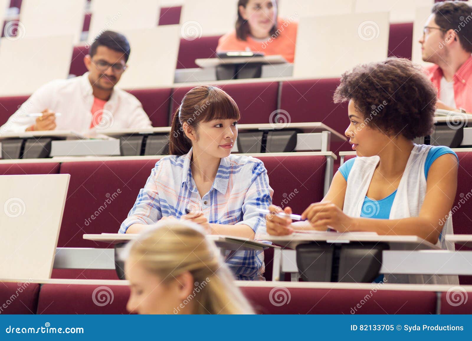 Group of Students Talking in Lecture Hall Stock Image - Image of ...