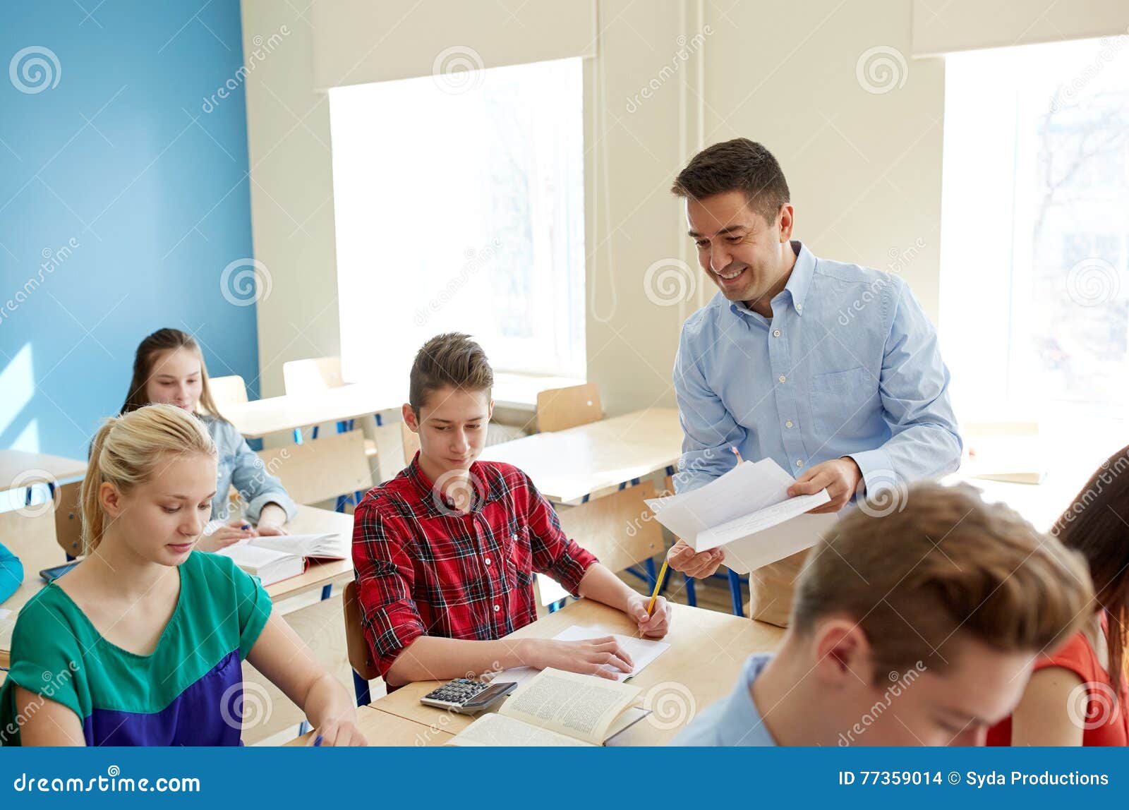 Group of Students and Teacher with Test Results Stock Photo - Image of ...