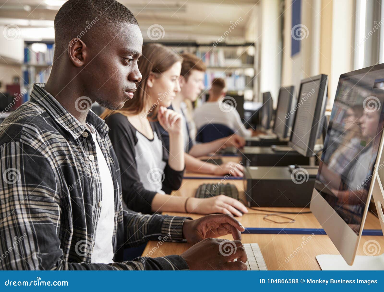 Group of Students Using Computers in College Library Stock Photo ...