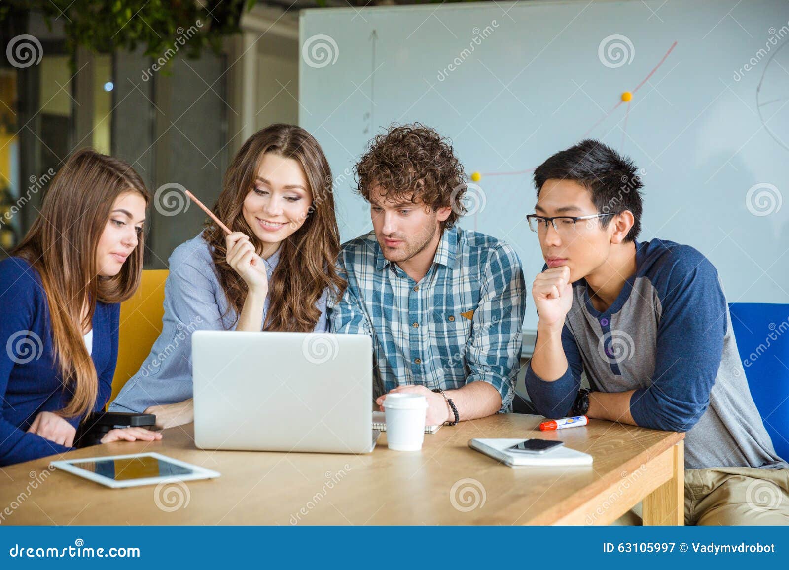 Group of Students Using Laptop Together Stock Image - Image of showing ...