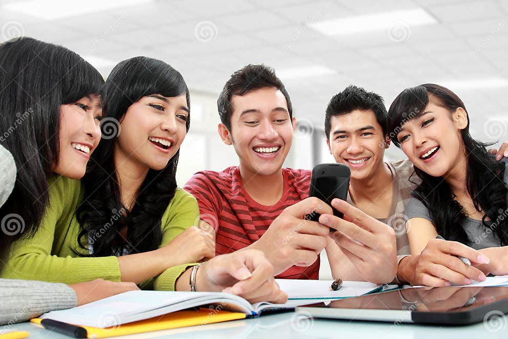 Group of Students Using Mobile Phone Stock Photo - Image of success ...