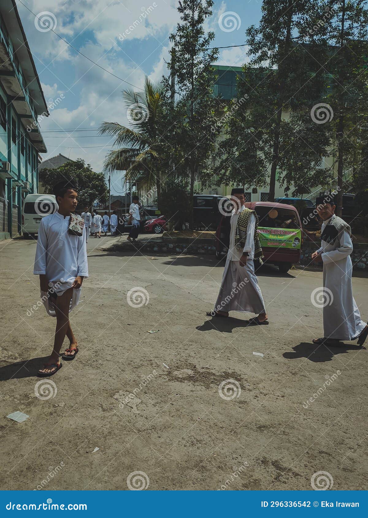 A Group of Students Walking in the Islamic Boarding School Area ...