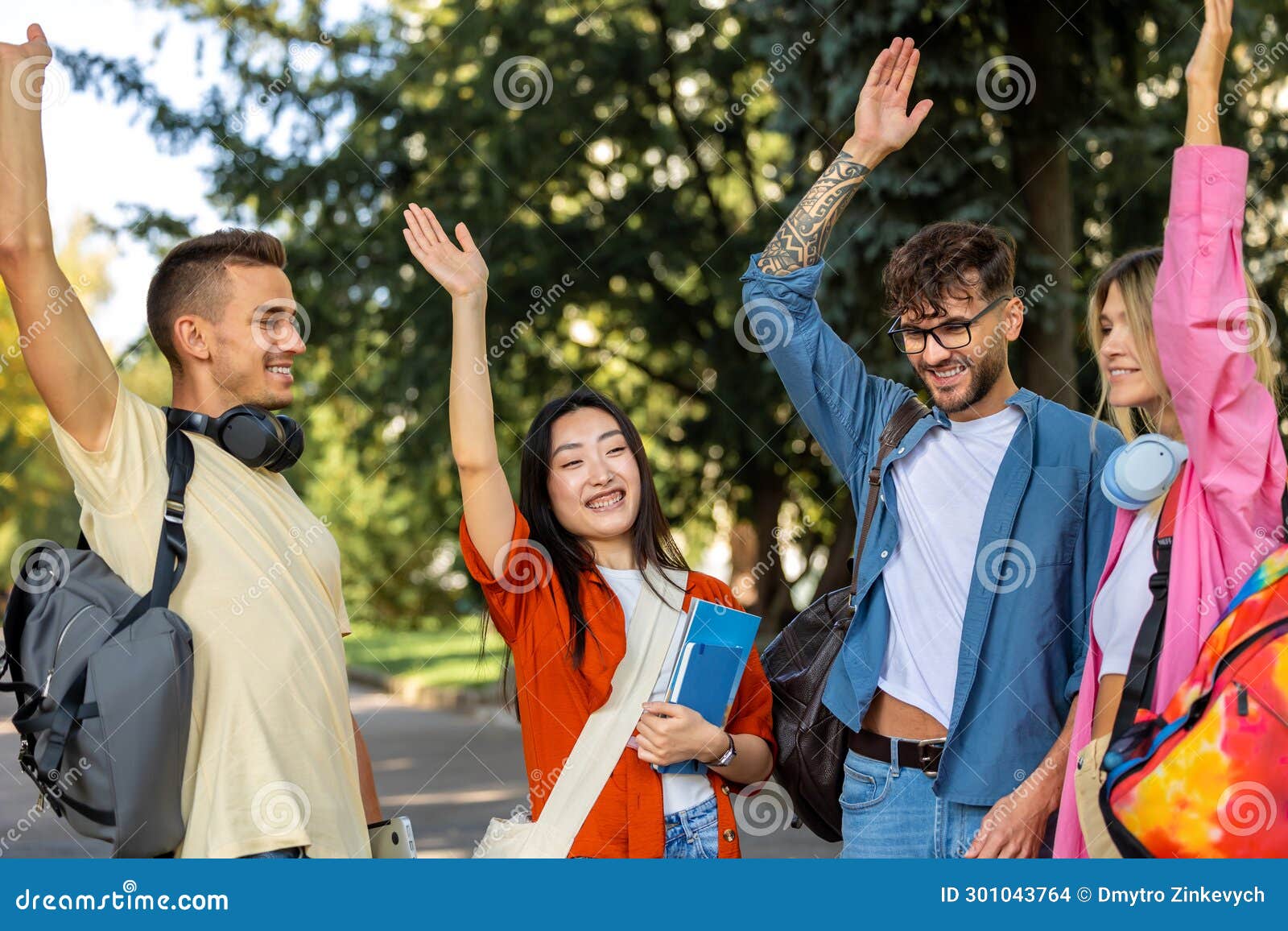 Group of Students Walking in the Park and Looking Excited Stock Photo ...