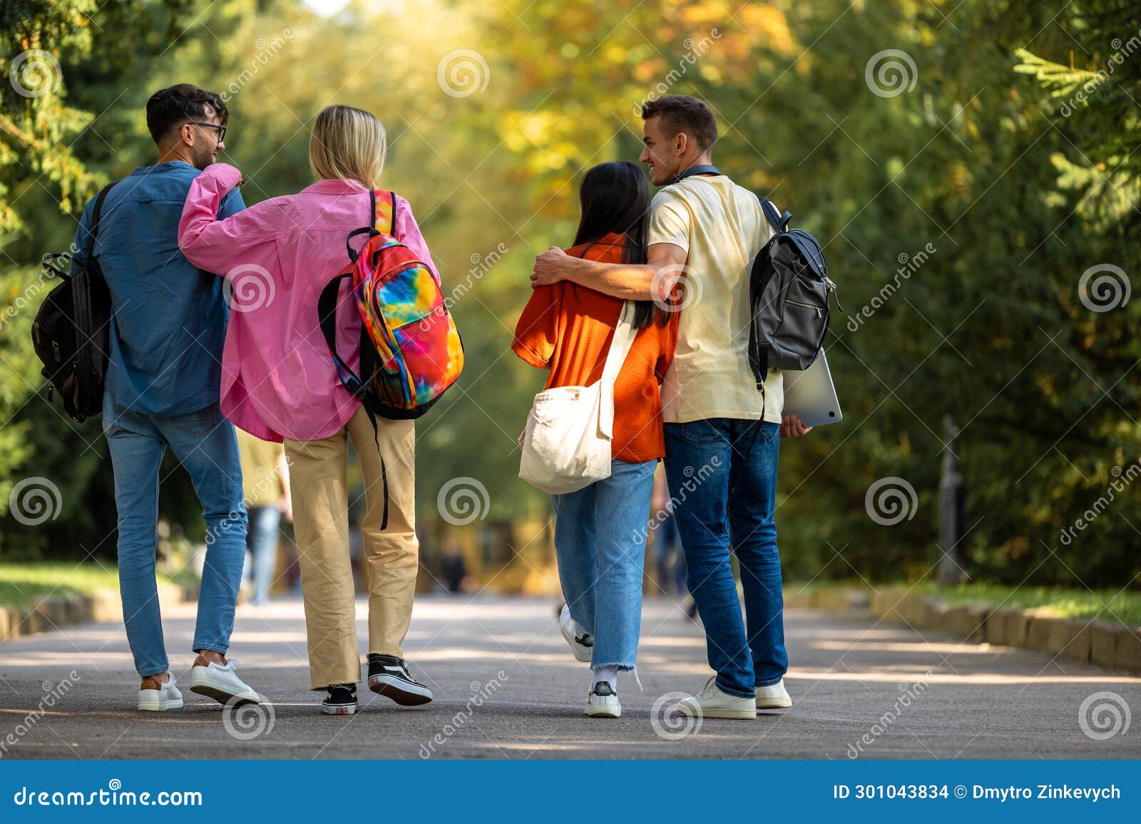 Group of Students Walking in the Park and Looking Excited Stock Photo ...