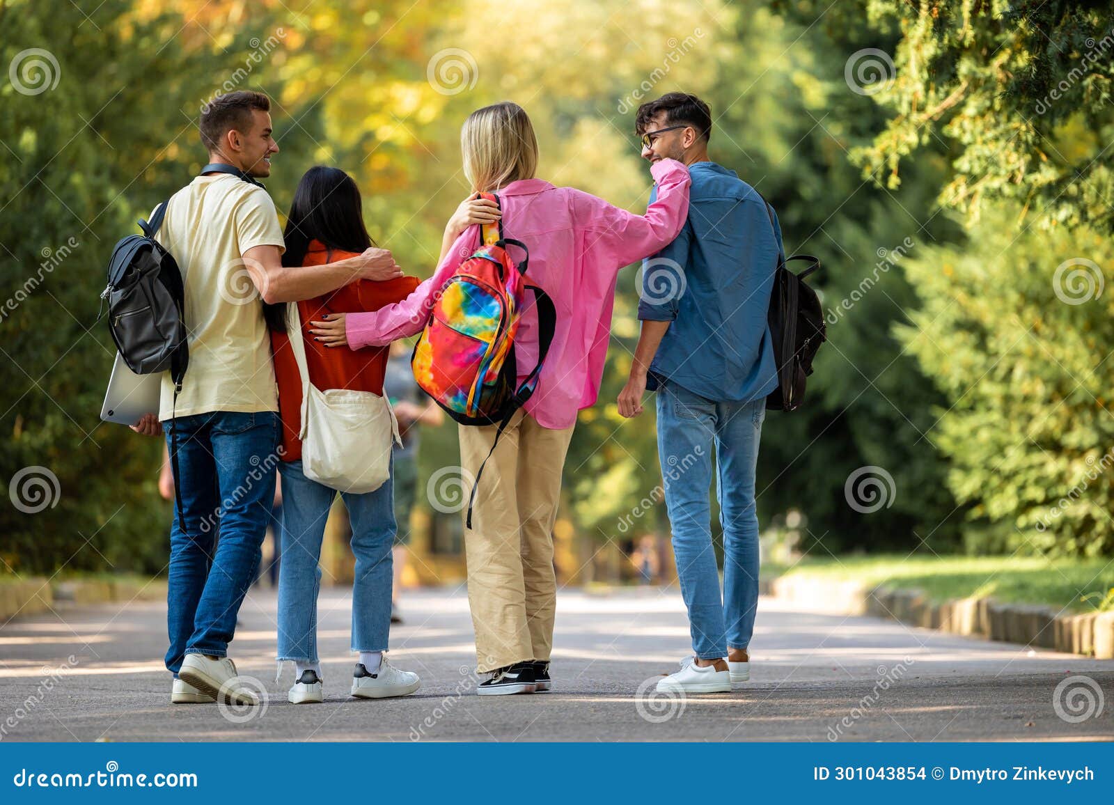 Group of Students Walking in the Park and Looking Excited Stock Photo ...