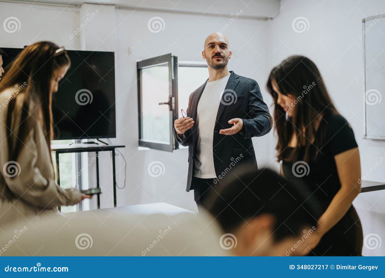 Professors and Students Collaborate on Project in Modern Classroom ...