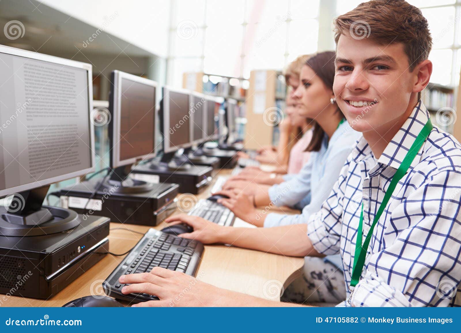 Group of Students Working at Computers in Library Stock Photo - Image ... Group of Students Working at Computers in Library Stock Photo - Image ...