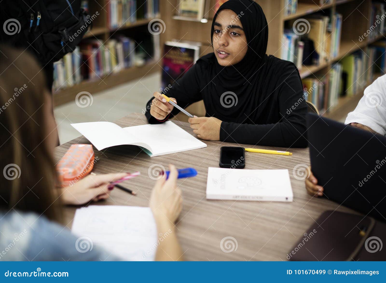 A Group of Students Working in the Library Stock Image - Image of high ...