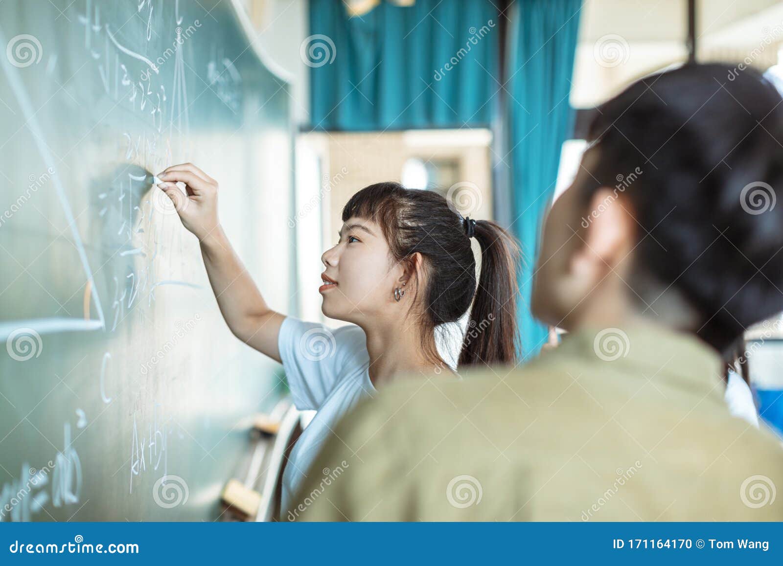 Group of Students Working on the Mathematical Problem Stock Photo ...