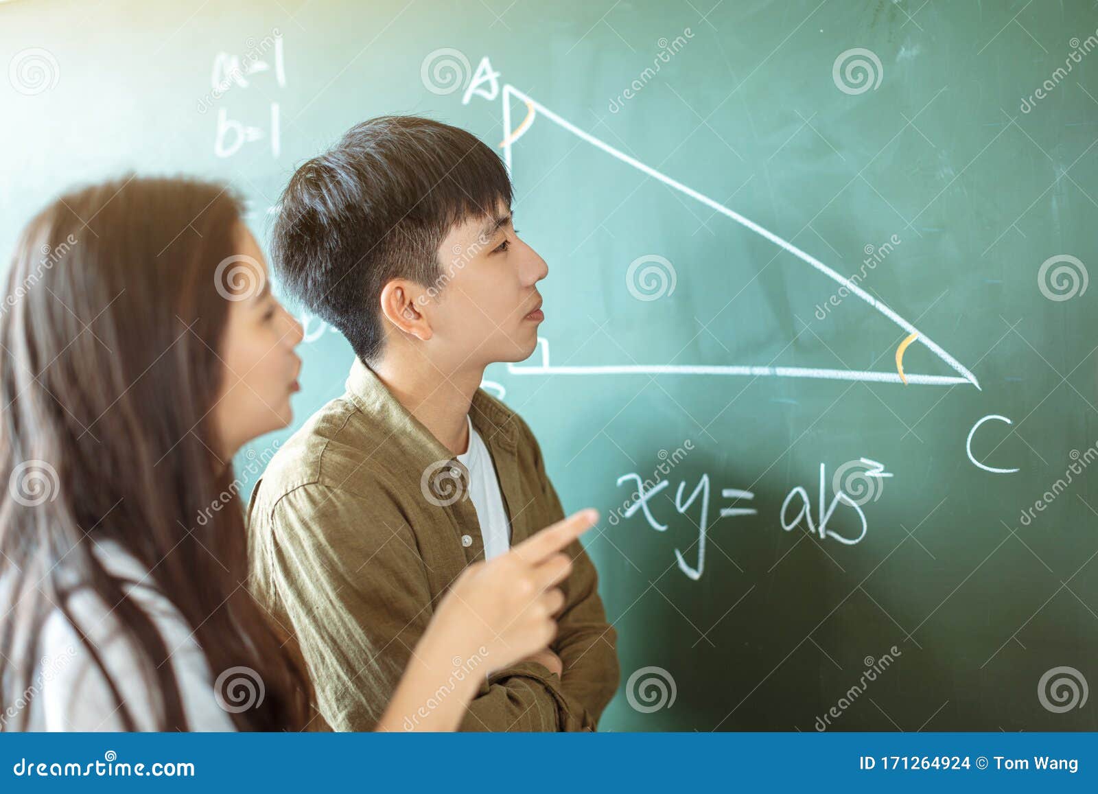 Group of Students Working on the Mathematical Problem in Classroom ...