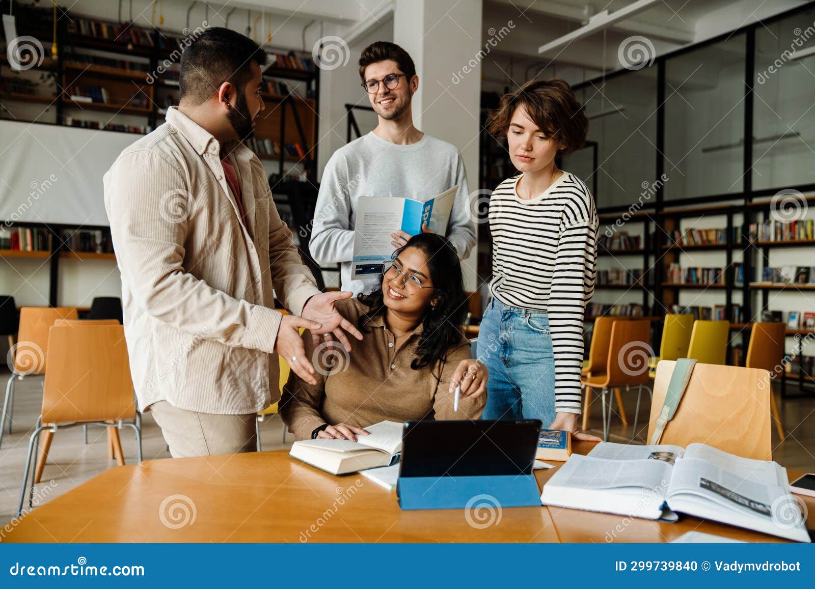 Group of Students Working on University Project in College Library ...