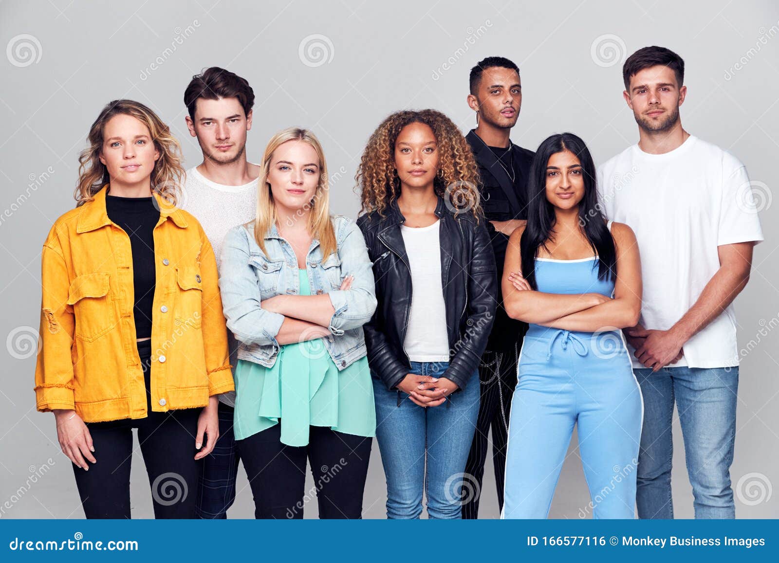 Group Studio Shot of Young Multi-Cultural Friends Smiling and Laughing ...