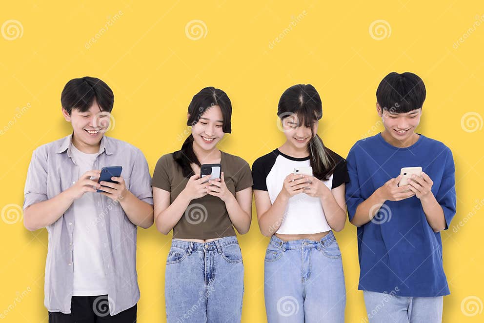 Group of Stylish Students Using Mobile Phone Stock Photo - Image of ...