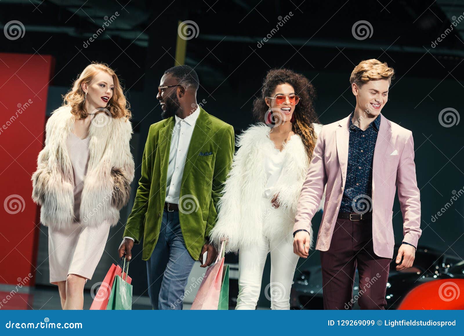 Group of Stylish Young Multicultural Shoppers Walking Stock Image ...