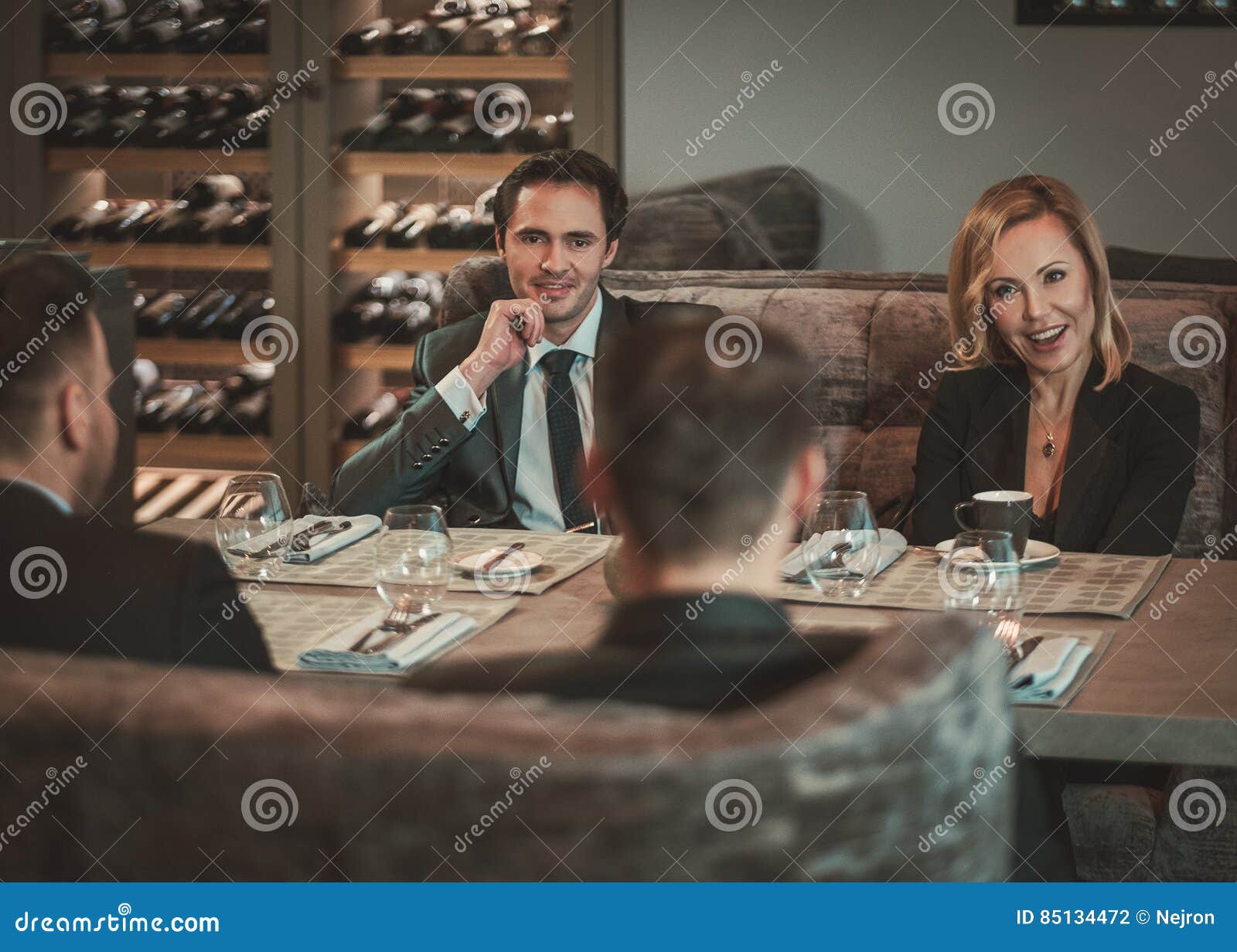 Group of Successful Business People Discussing during Business Dinner ...