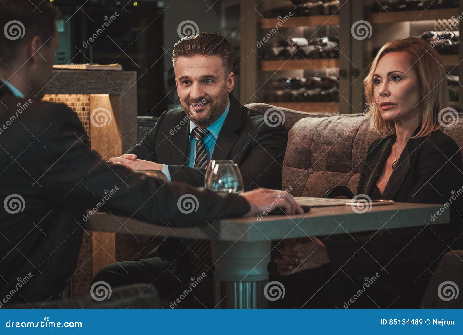 Group of Successful Business People Discussing during Business Dinner ...