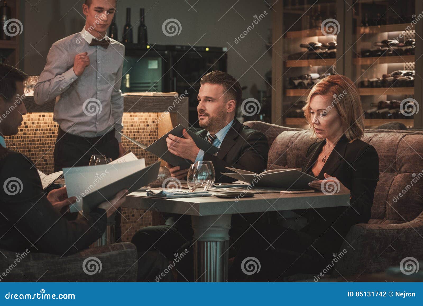 Group of Successful Business People with Menu in Restaurant Stock Photo ...