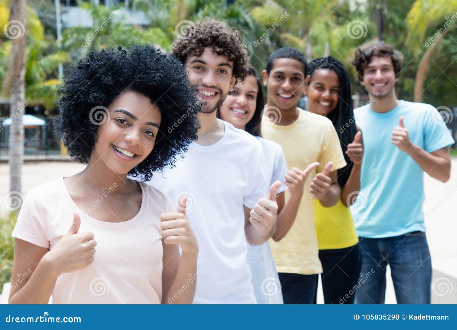 Group of Successful Multi Ethnic Young Adults in Line Stock Photo ...