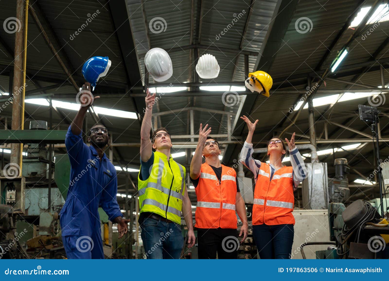 Group of Successful Multiethnic Engineer and Technician Worker Throwing ...
