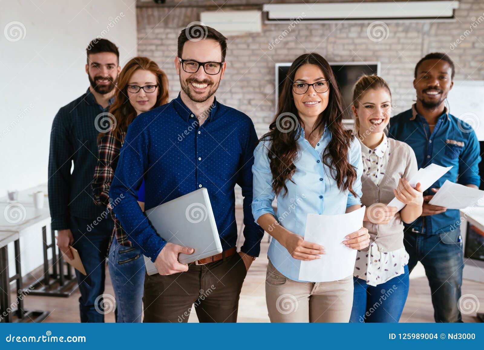 Group of Successful Young Architects Posing in Office Stock Photo ...