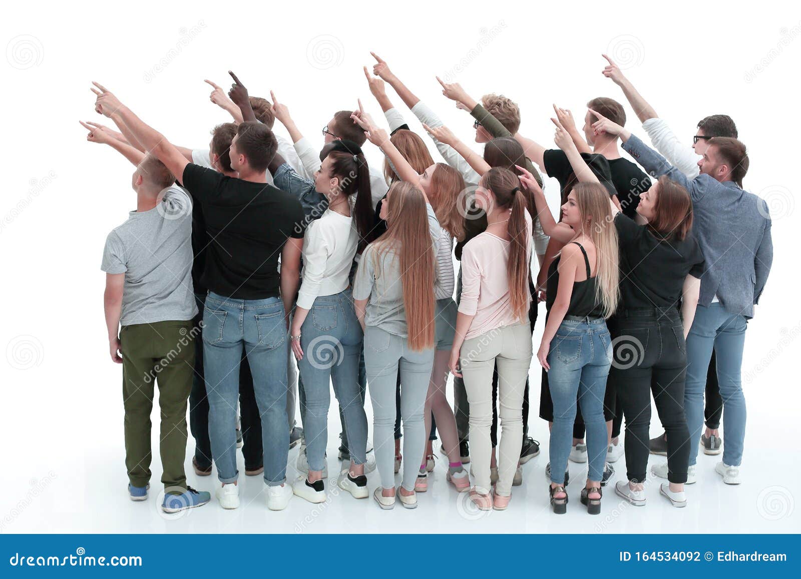 Group of Successful Young People Pointing in One Direction Stock Photo ...