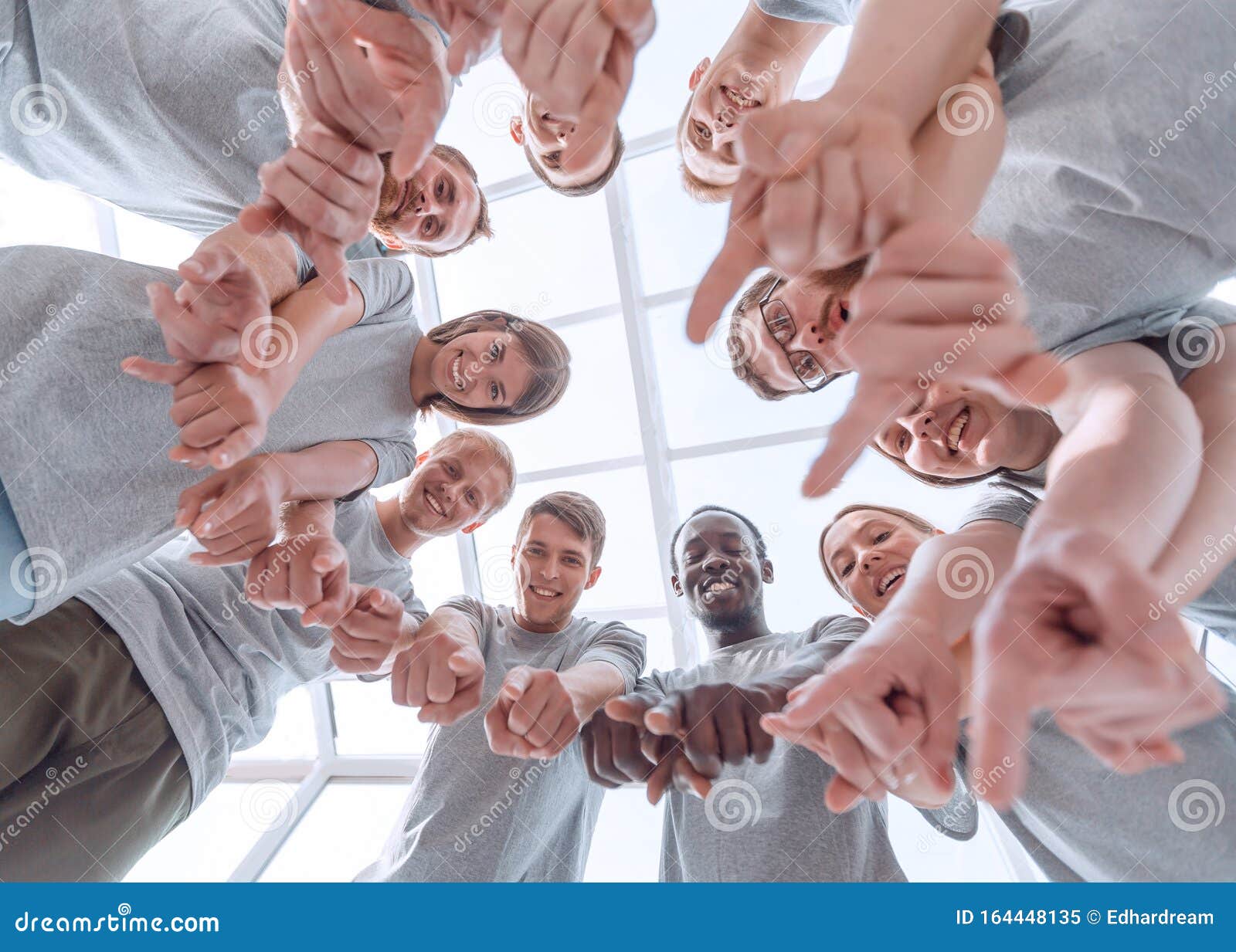 Group of Successful Young People Pointing at a Target . Stock Image ...