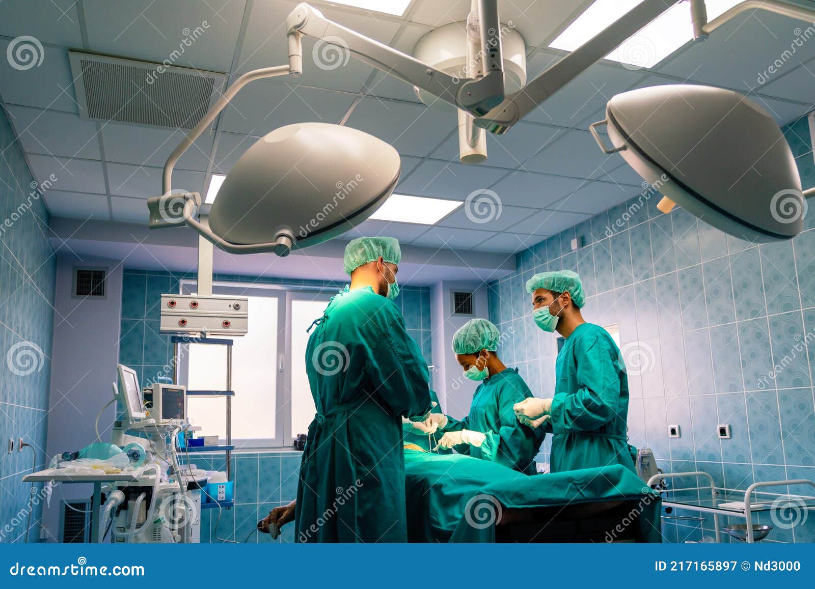 Group of Surgeon Doctor Team at Work in Operating Room. Stock Image ...