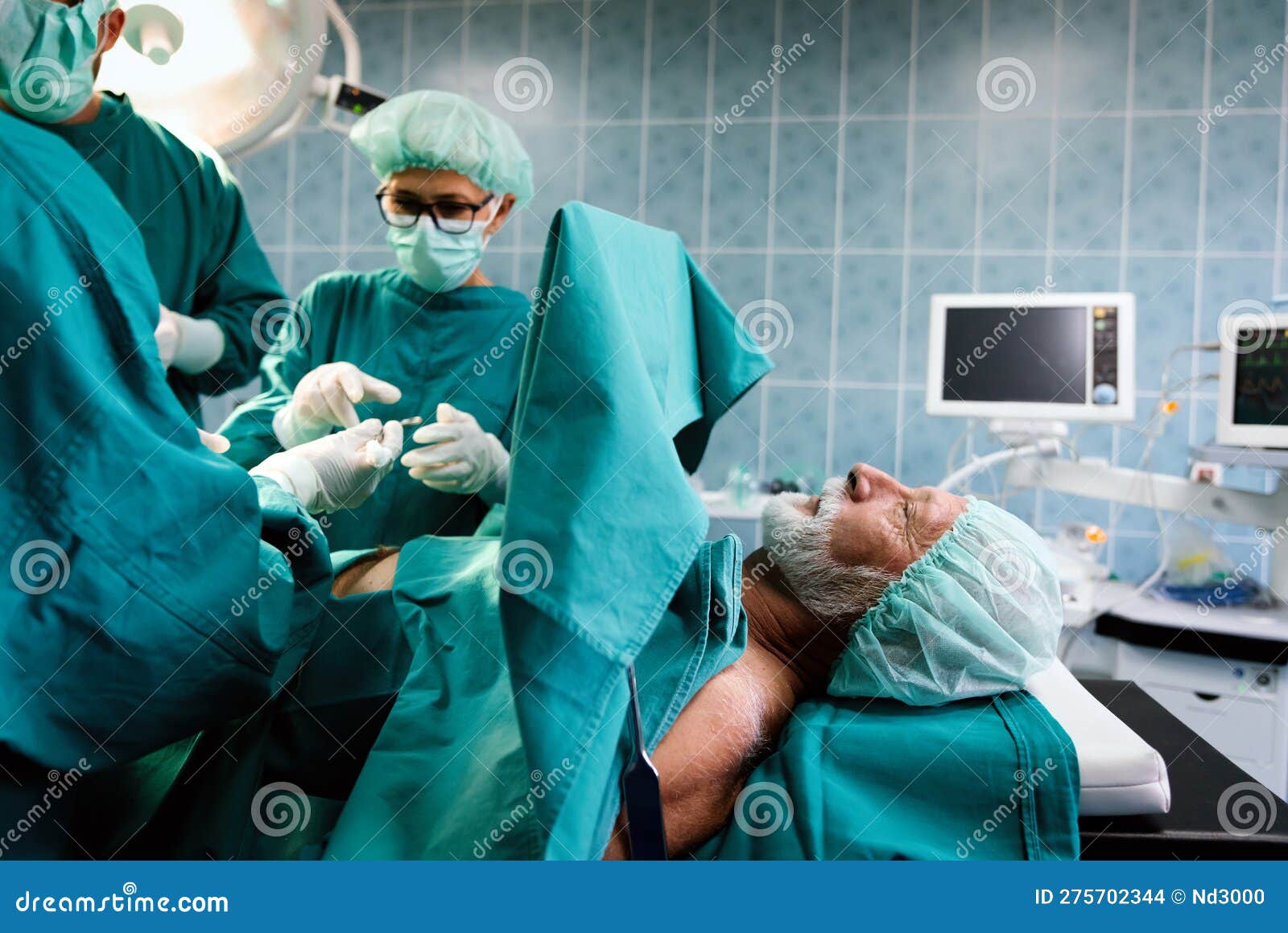 Group of Surgeon Doctor Team at Work in Operating Room. Stock Photo ...