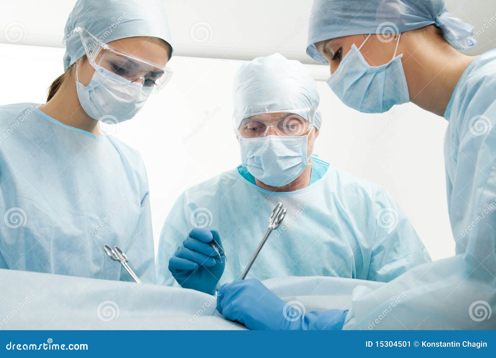 Group of surgeons stock image. Image of procedure, hospital - 15304501