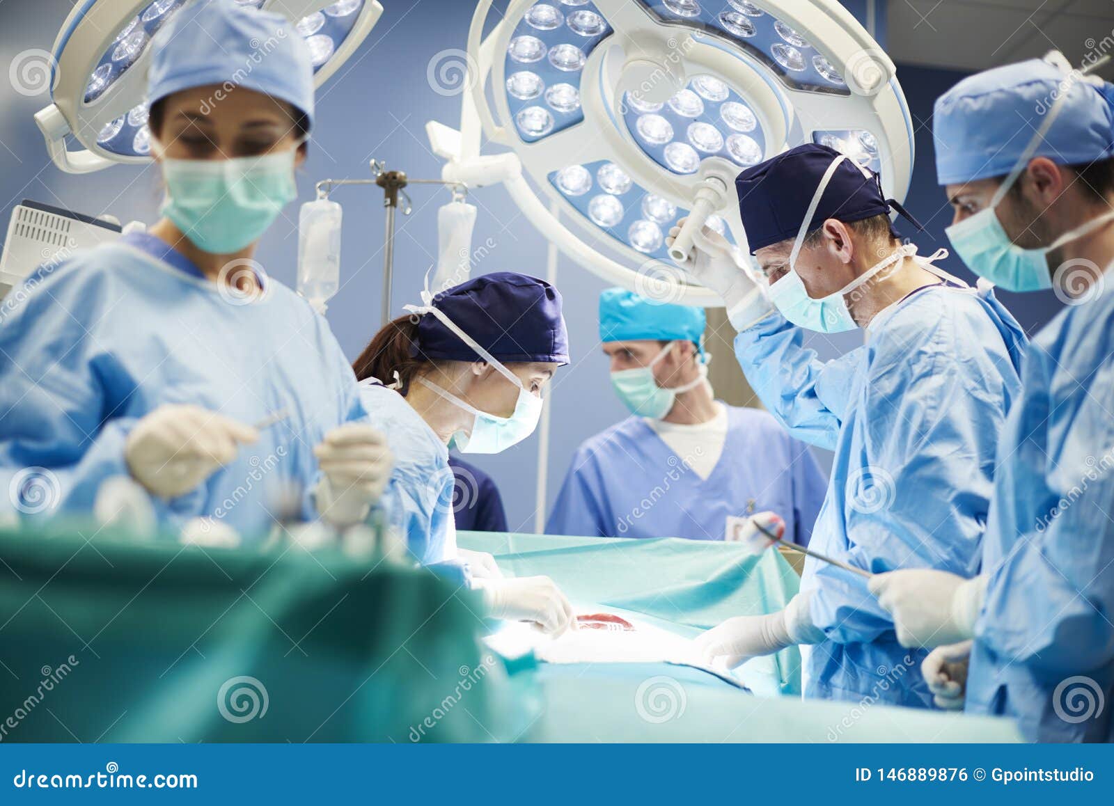 Group of Surgeons in Operating Room Stock Photo - Image of care ...