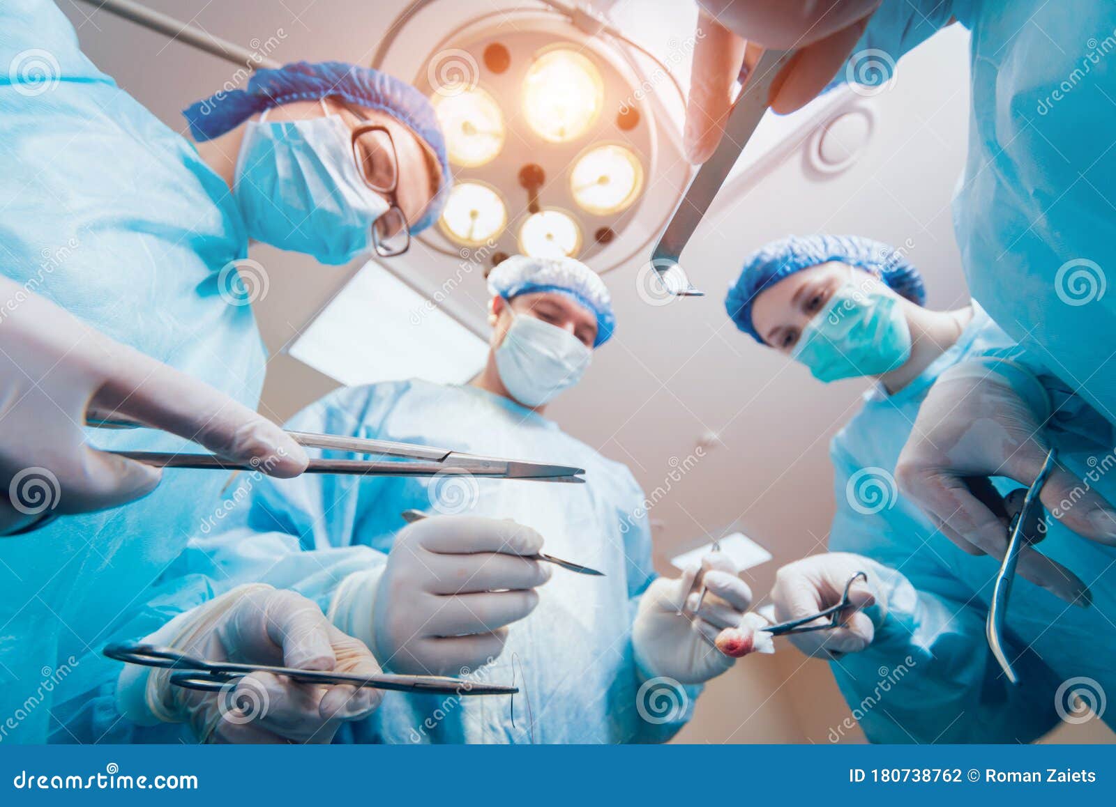Group of Surgeons in Operating Room with Surgery Equipment. Stock Photo ... Group of Surgeons in Operating Room with Surgery Equipment. Stock Photo ...