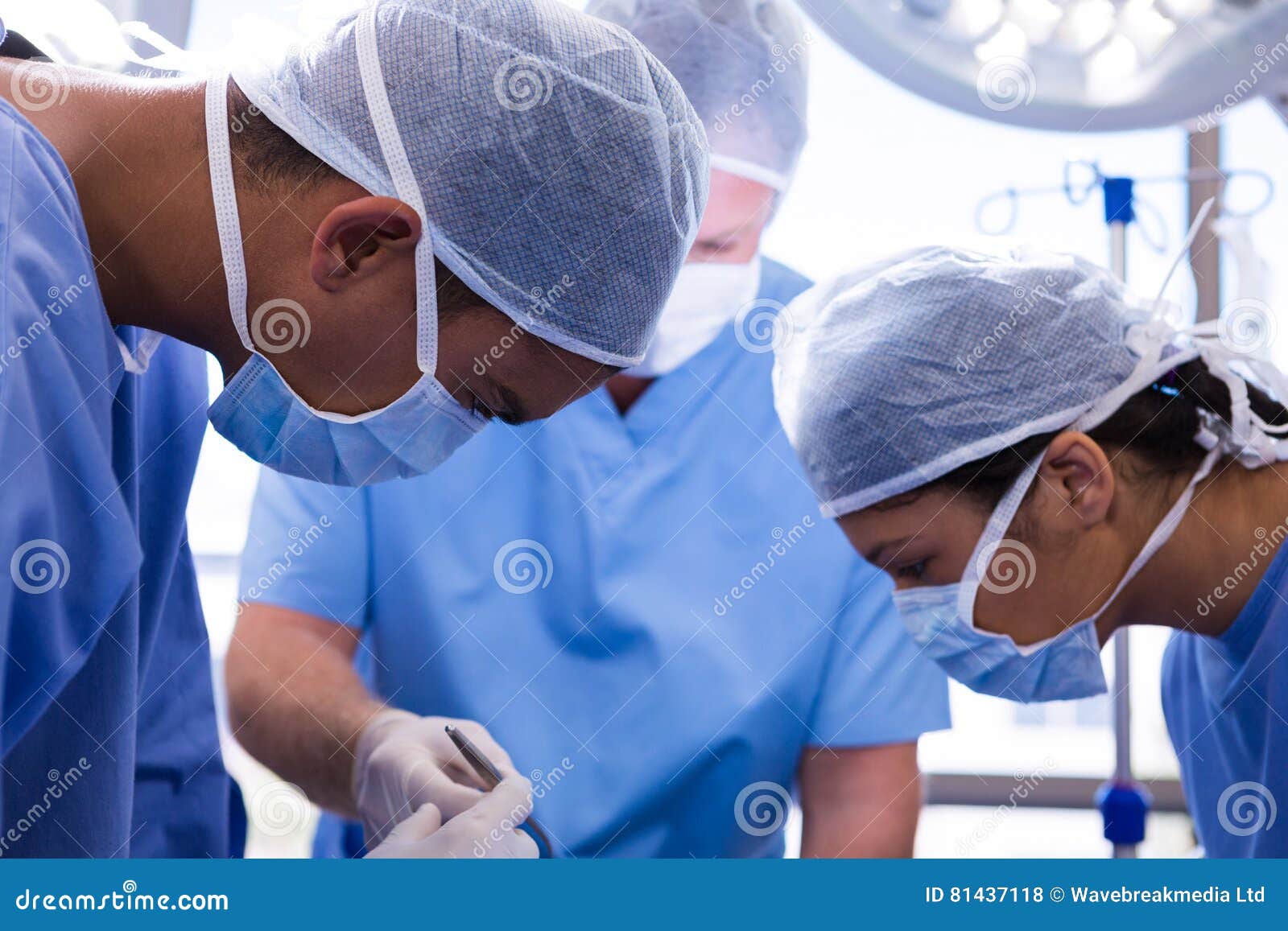 Group of Surgeons Performing Operation in Operation Room Stock Photo ...