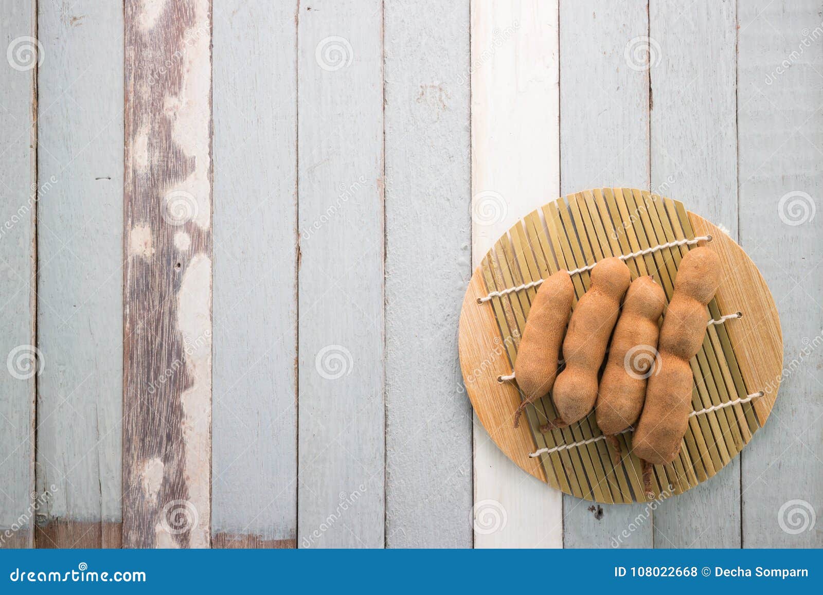 Tamarind on wood table stock photo. Image of freshness - 108022668