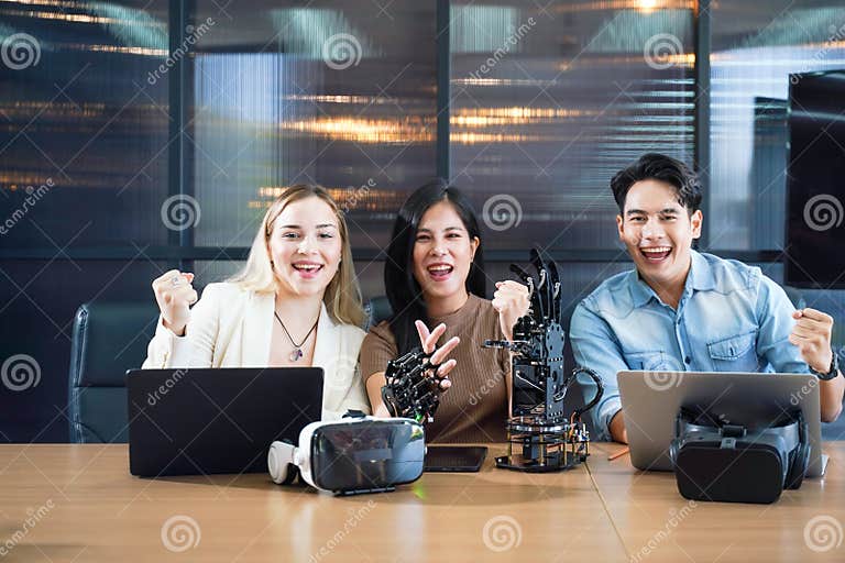 Group Team Work Programer and Engineer Working AI Robot Arm System ...