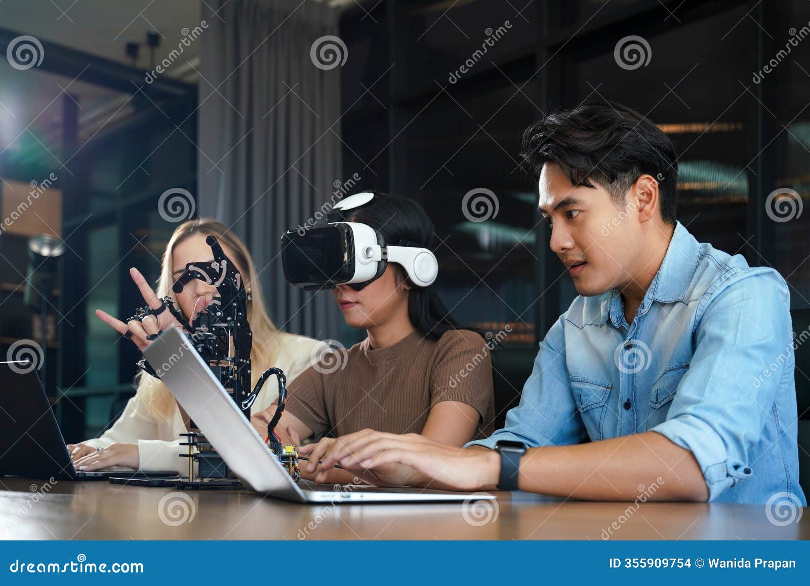 Group Team Work Programer and Engineer Working AI Robot Arm System ...