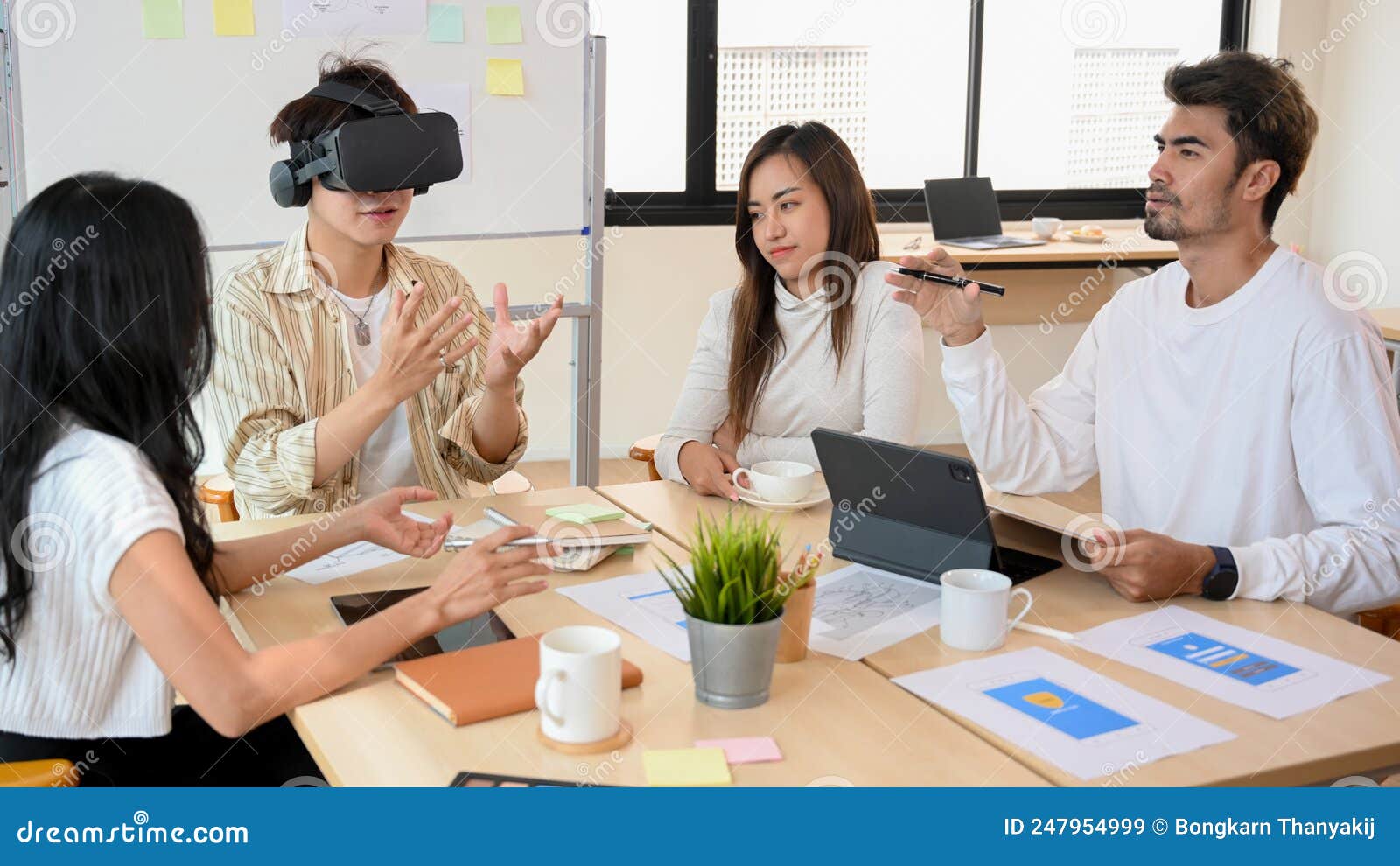 A Group of Tech Developers Having a Meeting in the Office Stock Image ...