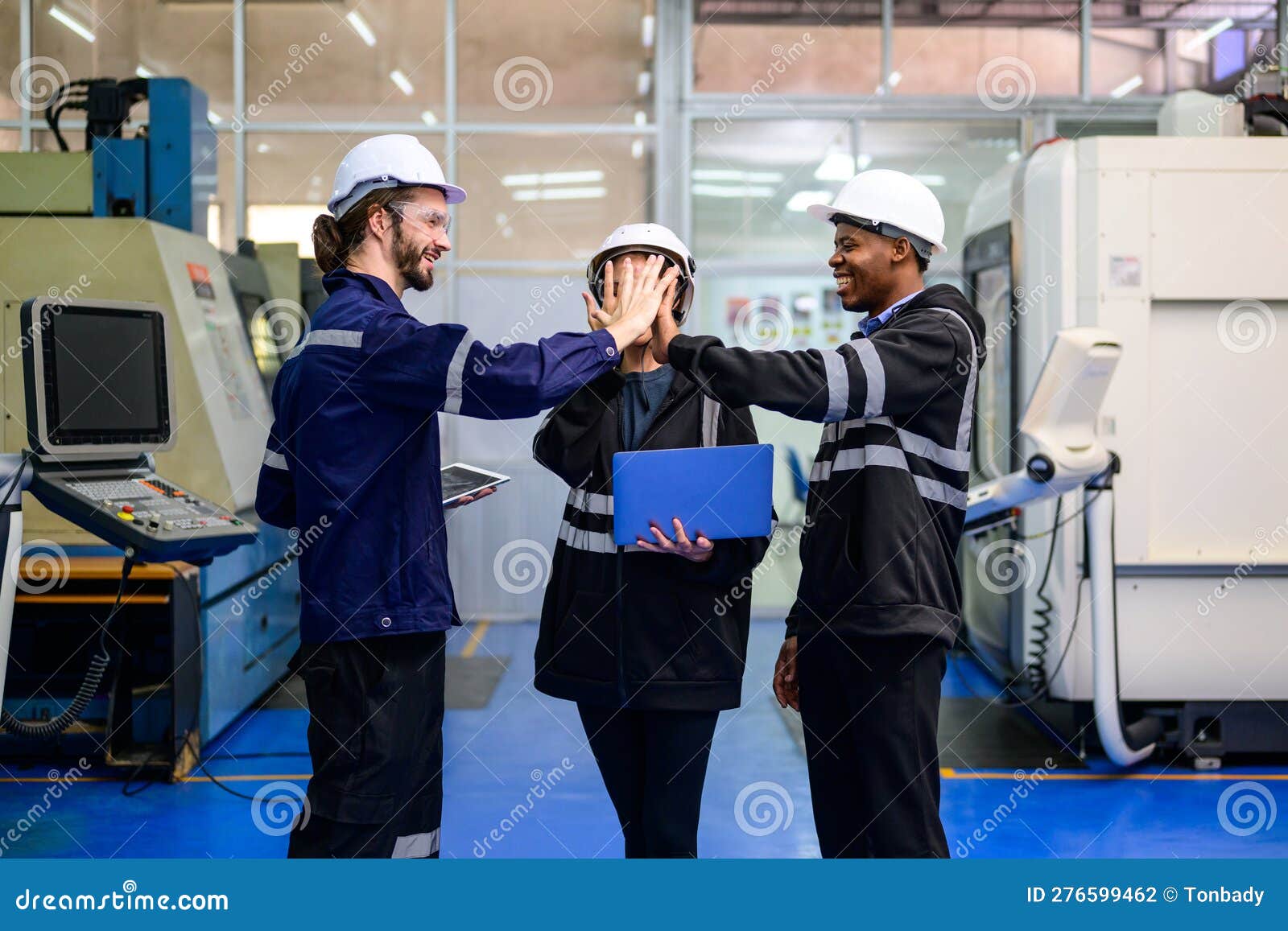 Group of Technicians Engineers Team Working at Industrial Factory Stock ...