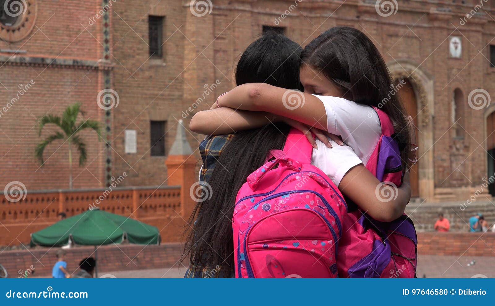 Female Teen Students Hug stock photo. Image of young - 97646580
