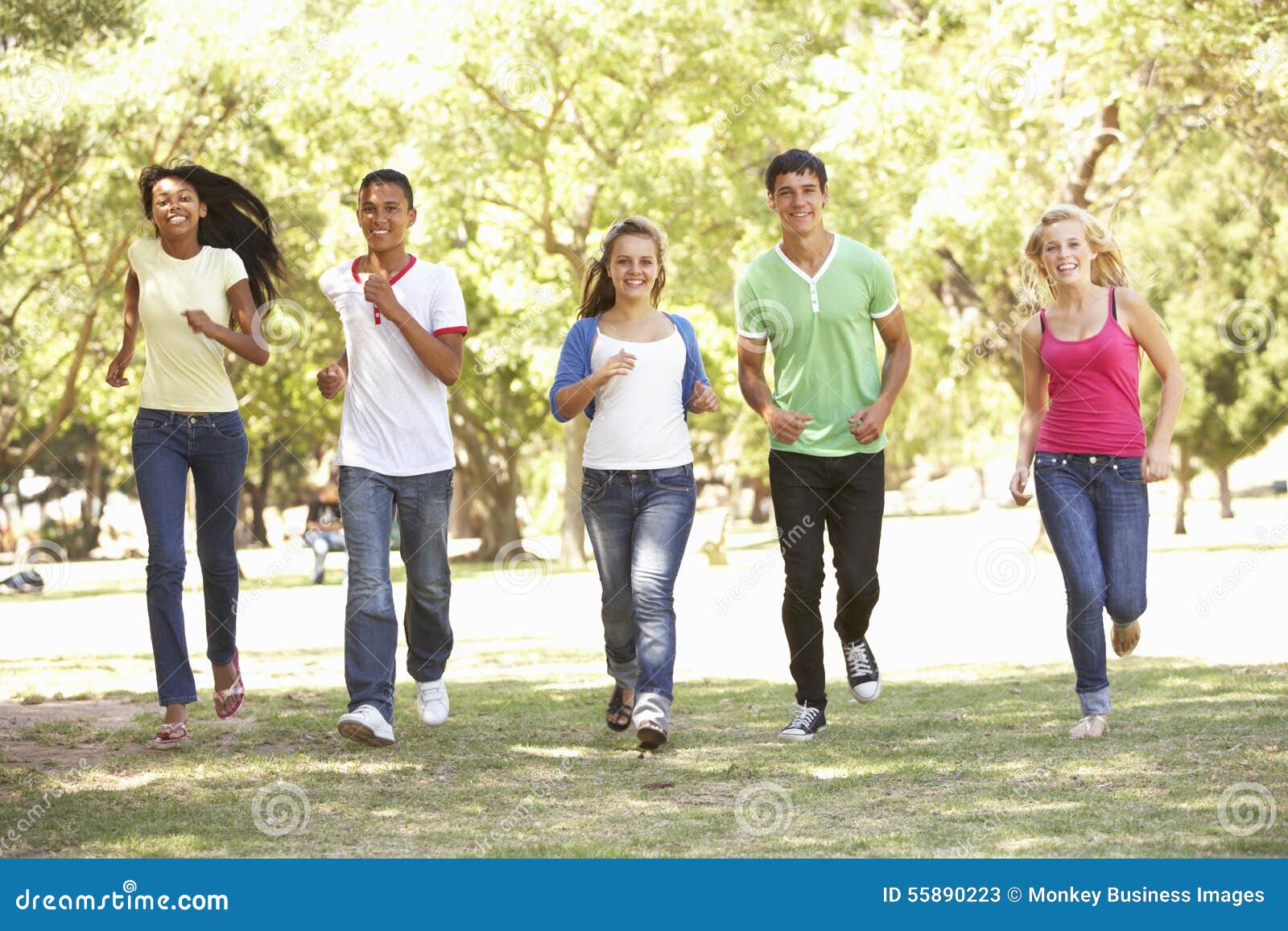 Group of Teenage Friends Running in Park Stock Image - Image of ...